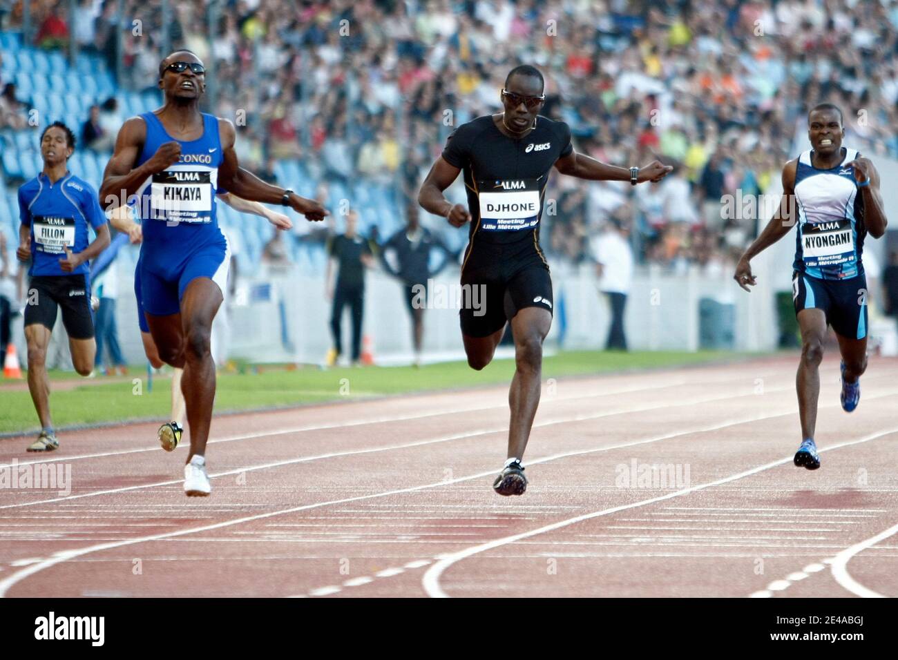 Congo's Gary Kikaya with France's Lesli Djhones perform on 400 meters ...