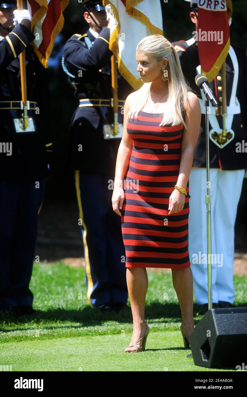 Singer Jessica Simpson performs the National Anthem at the opening ...