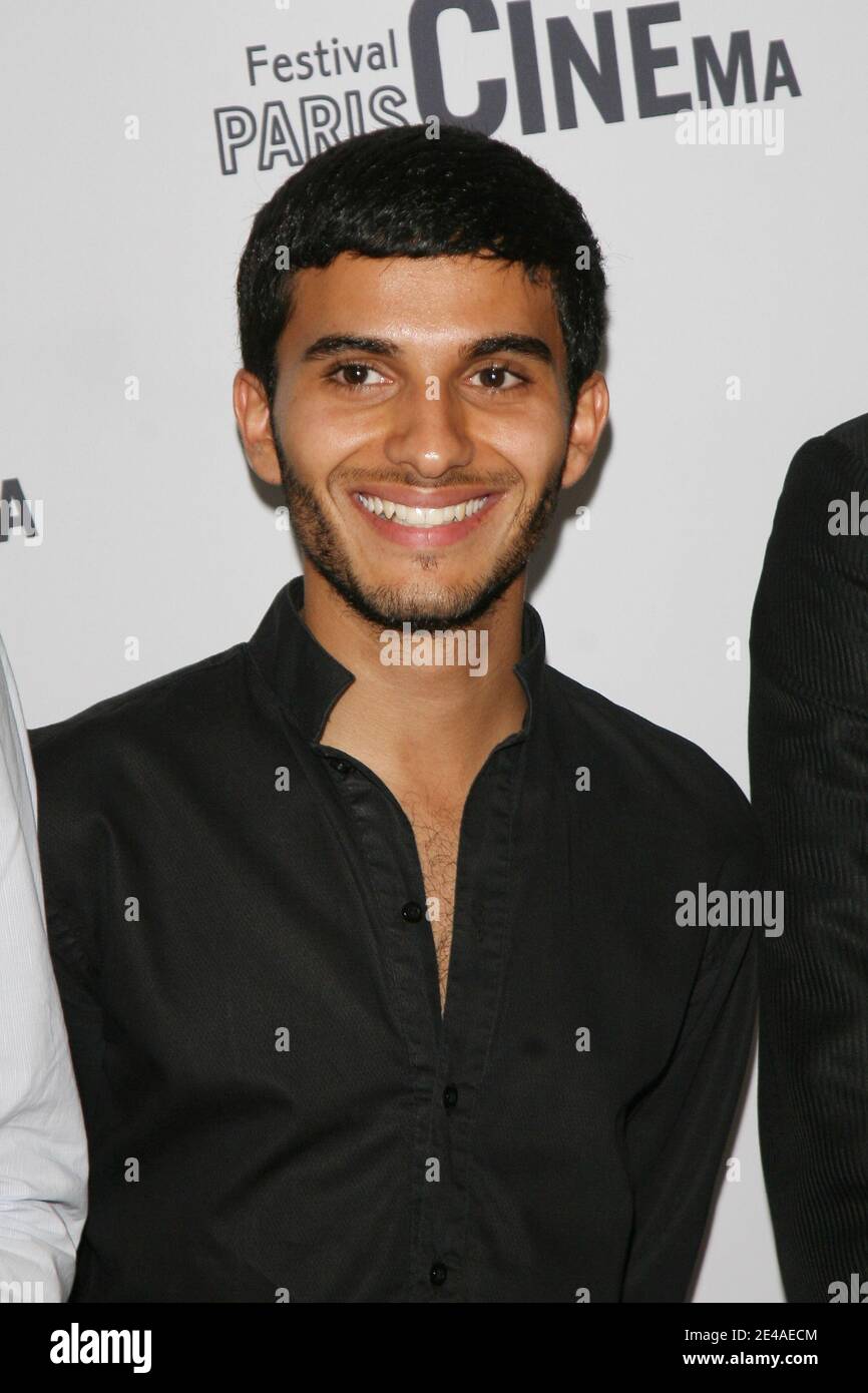 Mehdi Dehbi poses during the premiere of 'La folle histoire de Simon ...