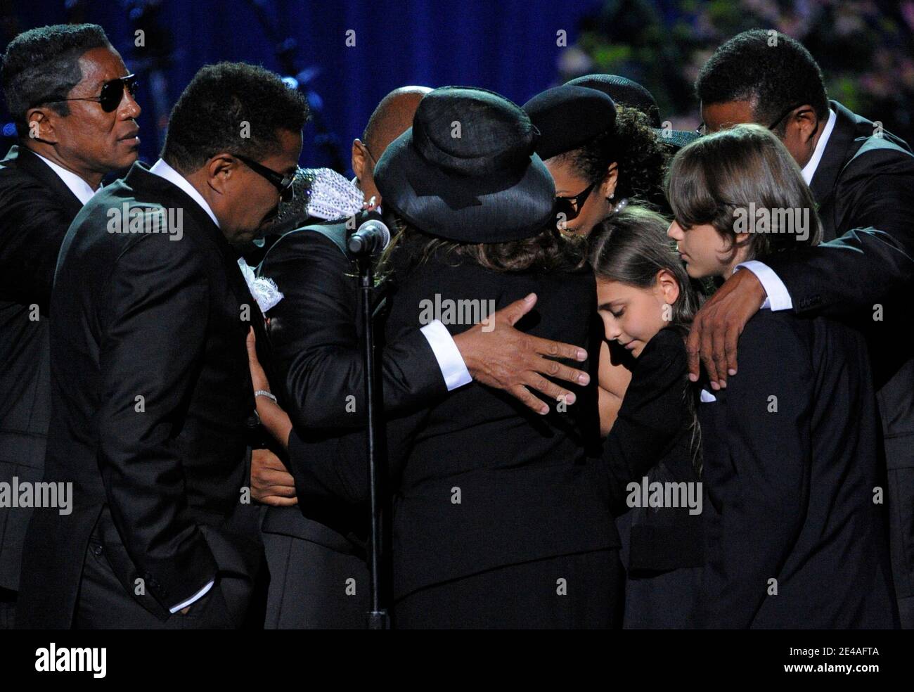 The Jackson family hugs during the memorial service for Michael Jackson ...