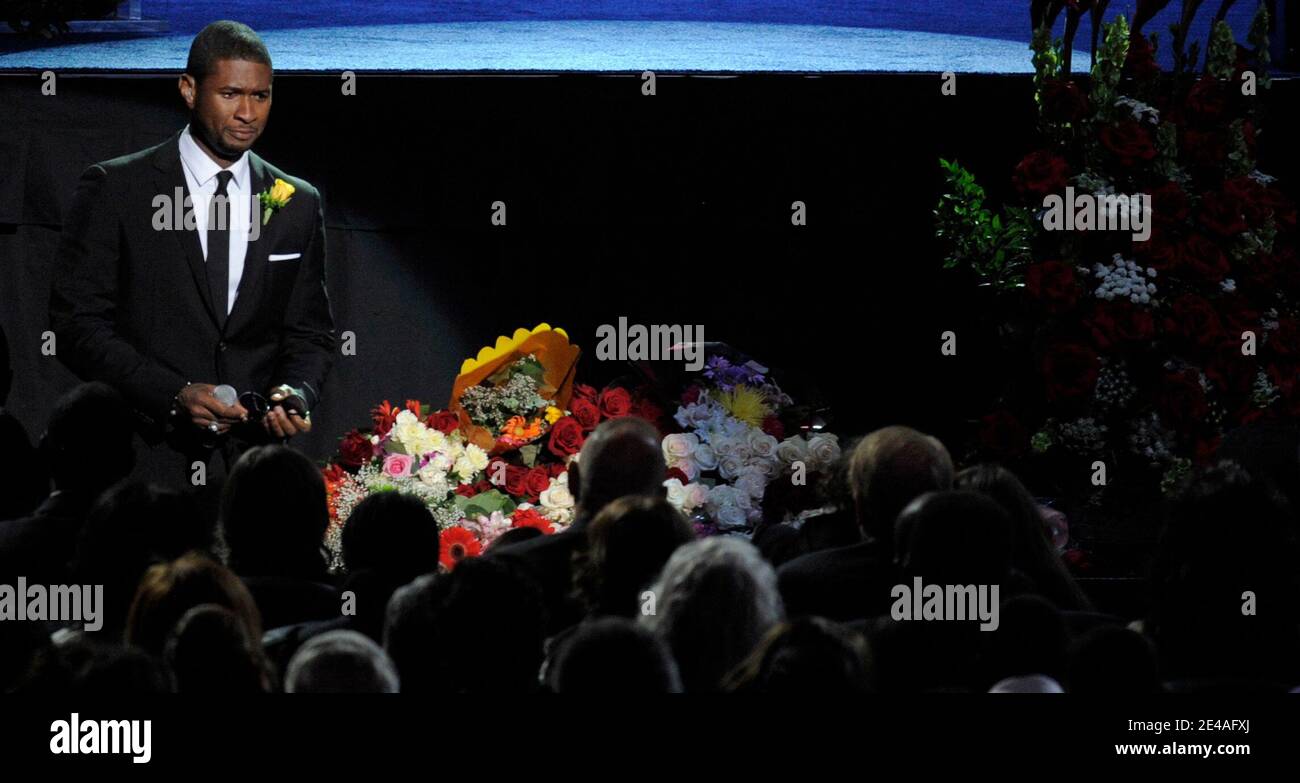Singer Usher performs during the memorial service for Michael Jackson ...