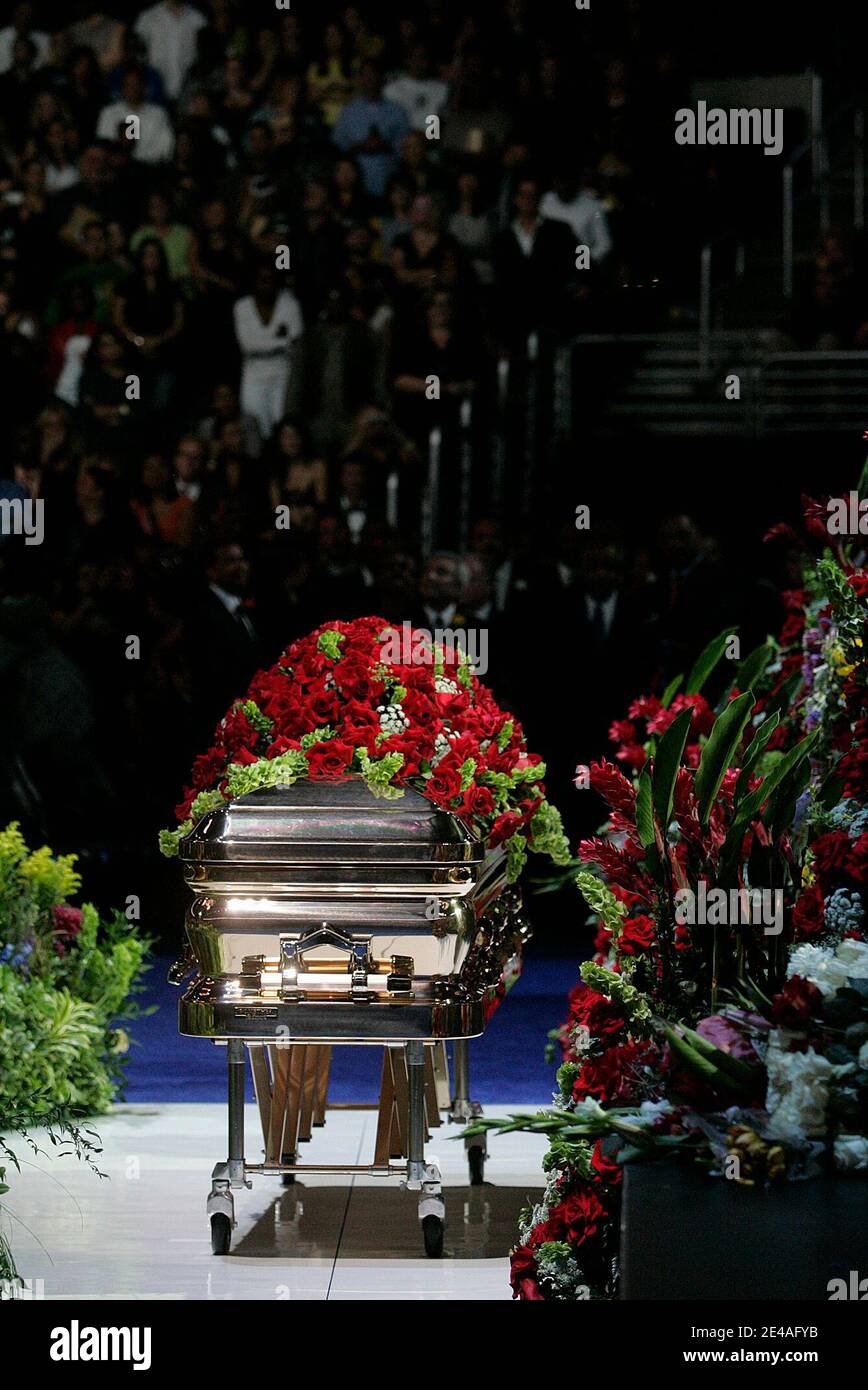 The rose covered coffin holding the remains of Michael Jackson rests in ...