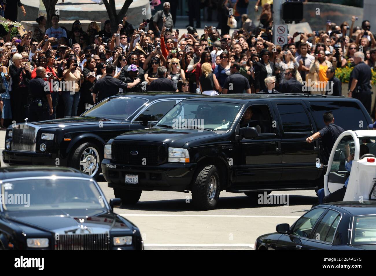 Family and guest leave the Staples Center after the Michael Jackson ...