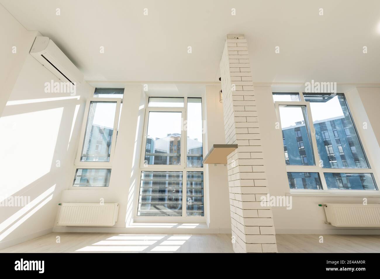 New empty small room in renovated home Stock Photo - Alamy