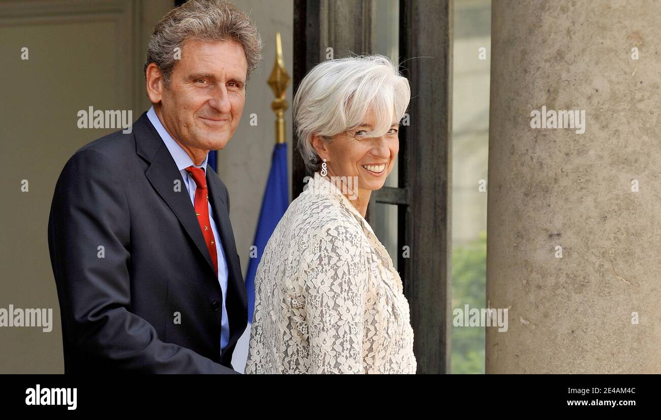 Christine Lagarde and her husband arrive for the Garden Party at Elysee ...