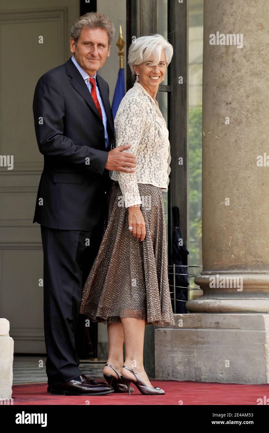 Christine Lagarde and her husband arrive for the Garden Party at Elysee ...
