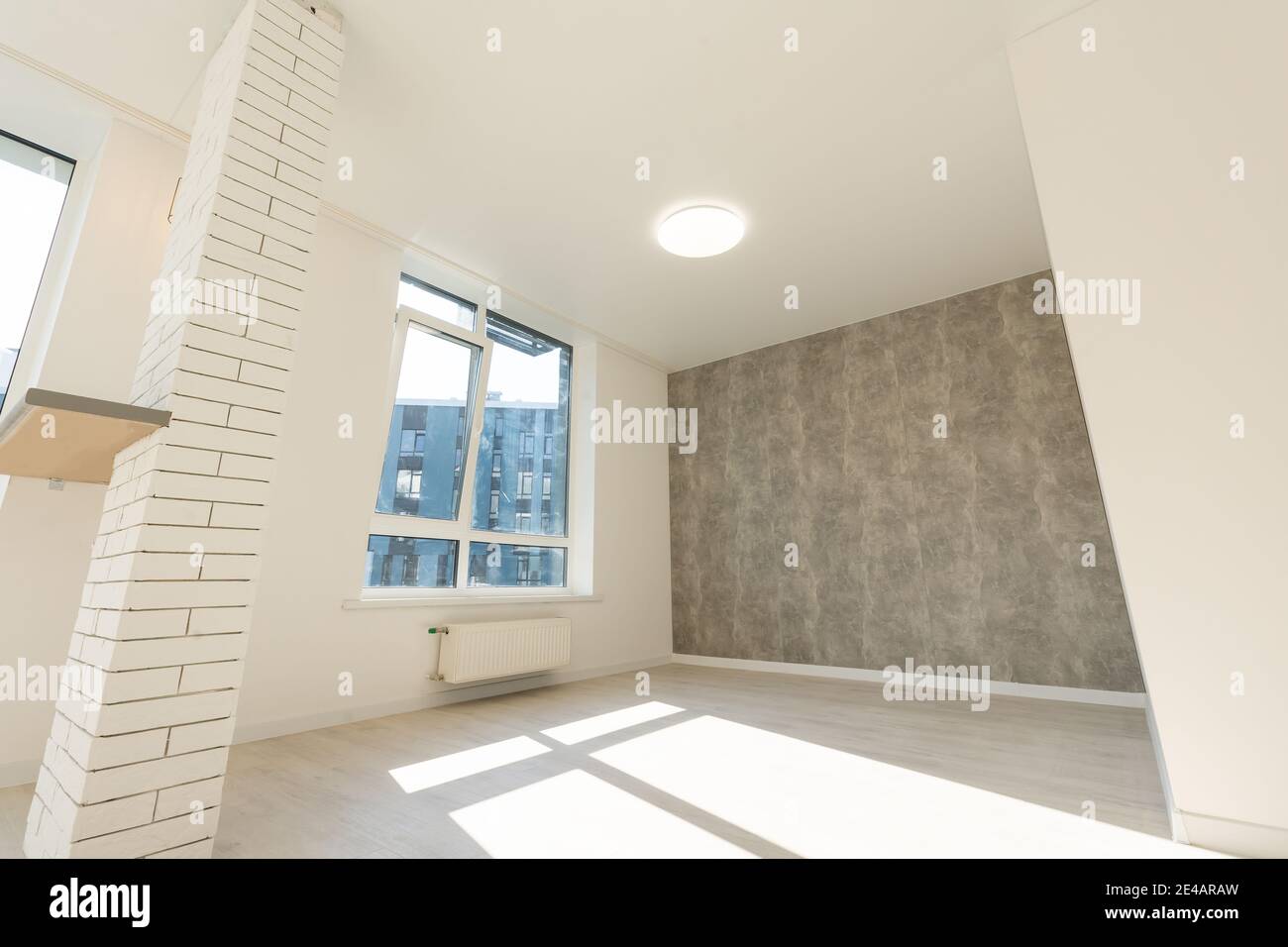 New empty small room in renovated home Stock Photo - Alamy