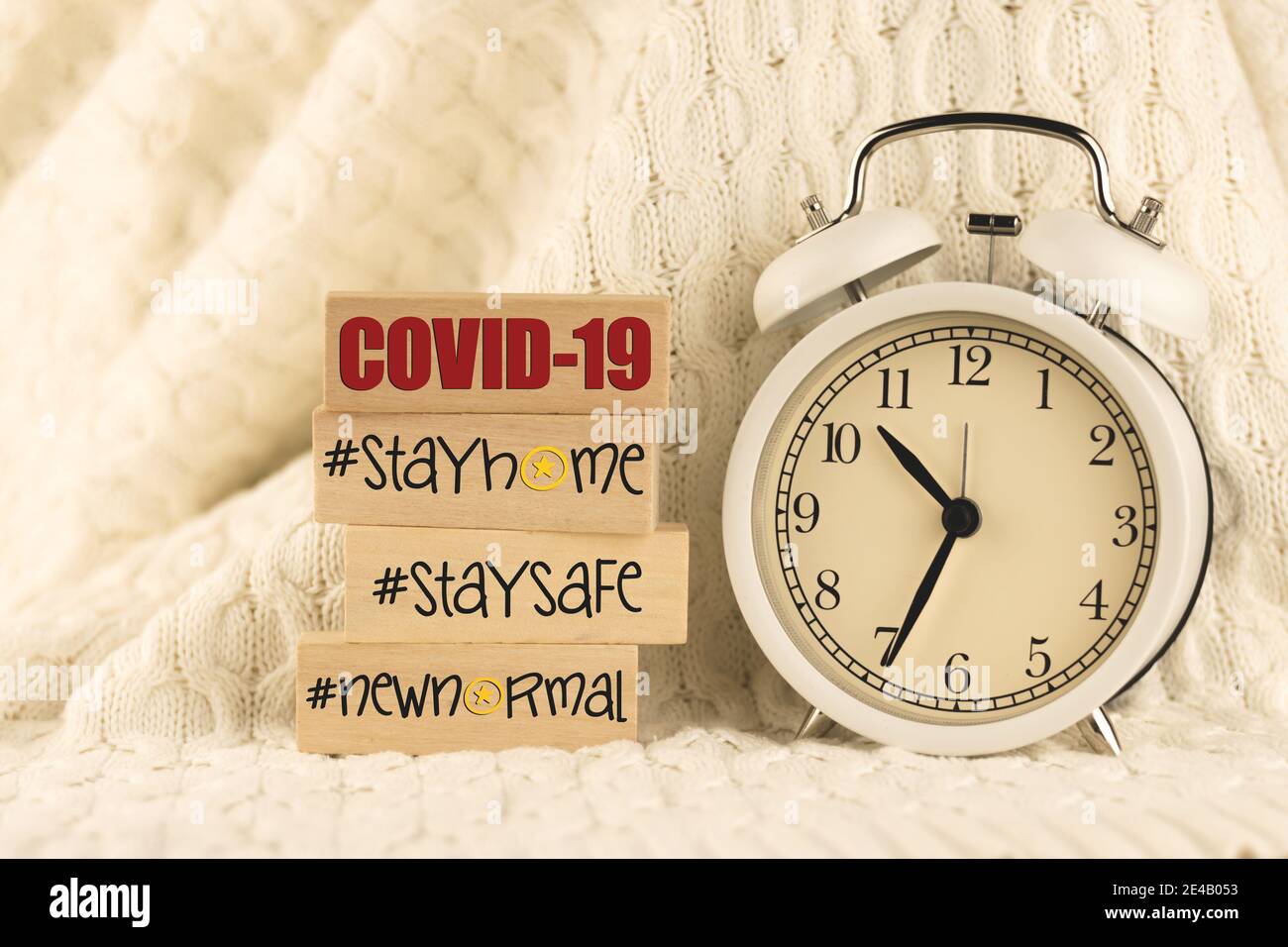 Stay home hashtags background with wooden peg and text, stay safe and ...