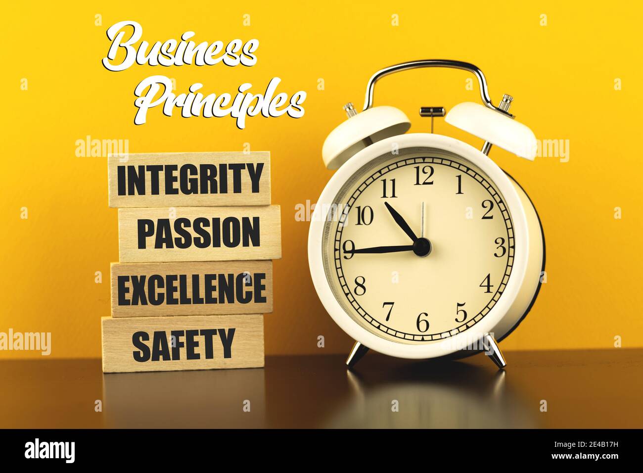 Business principles template with wooden pegs, blocks, conceptual photo ...