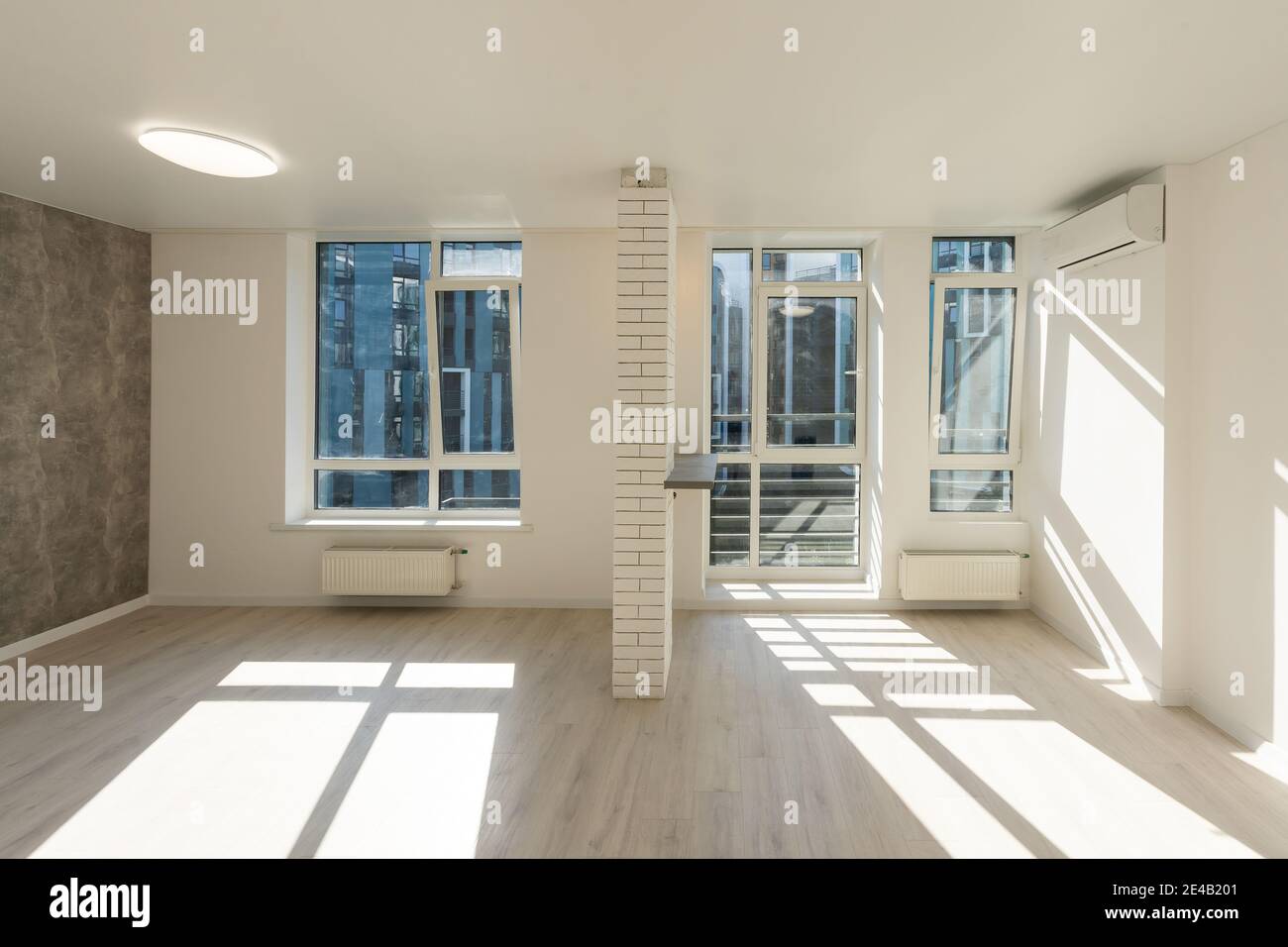 New empty small room in renovated home Stock Photo - Alamy