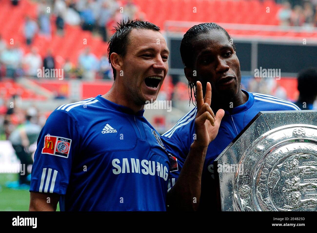 Chelsea's John Terry and Didier Drogba celebrates with the Community ...
