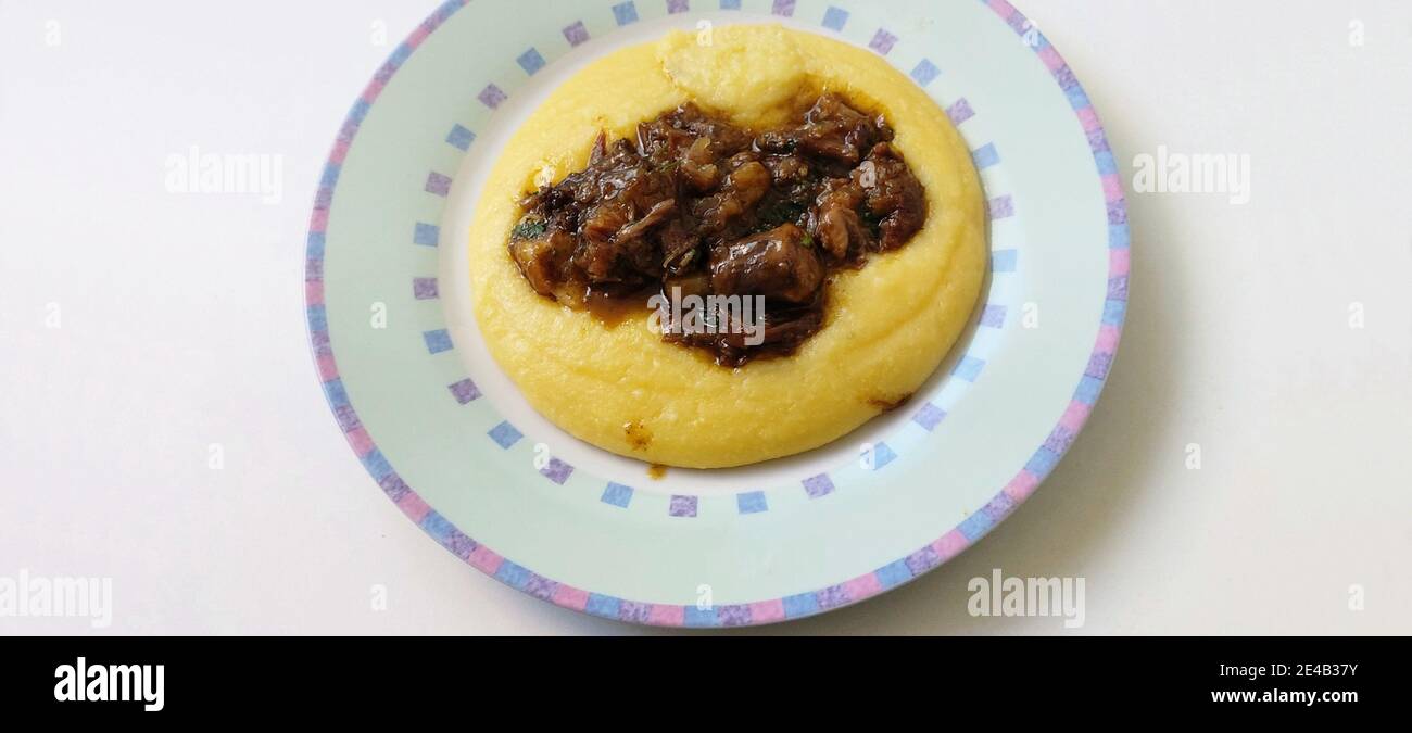 Traditional brazilian dish, Corn meal with oxtail stew, rabada with ...