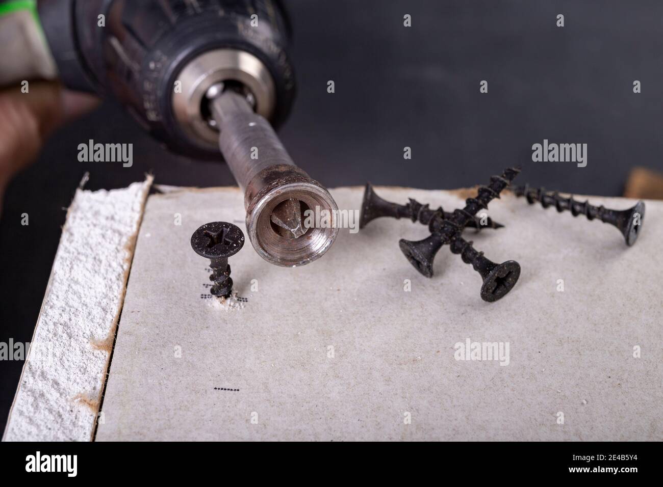 Black screws for fixing plasterboards. Building a wall of drywall ...
