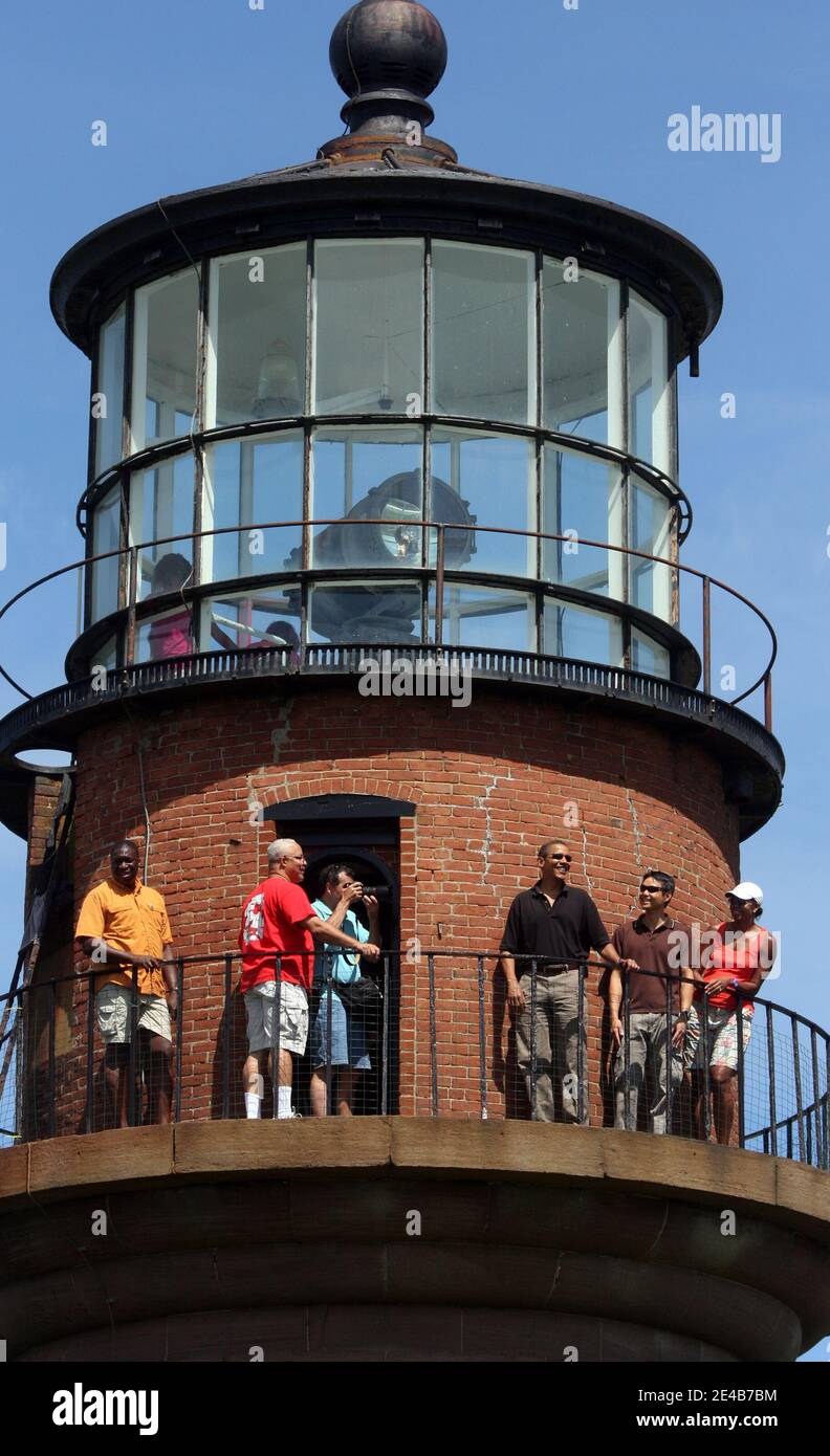 President Barack Obama and his wife Michelle, with brother-in-law ...