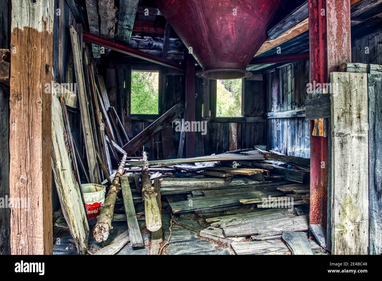 Half collapsed hut with red hopper hi-res stock photography and images ...