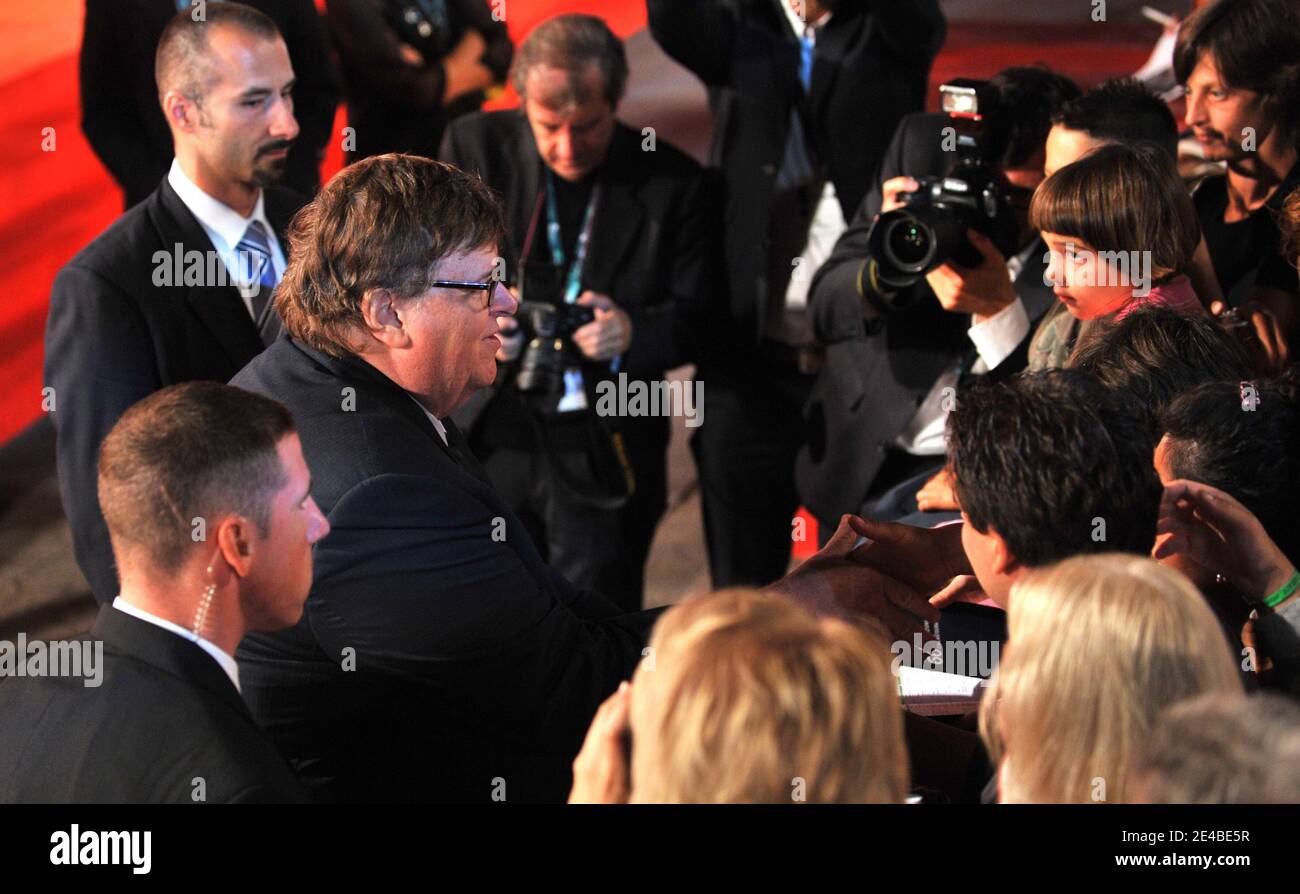 Director Michael Moore and his wife Kathleen Glynn attending the ...
