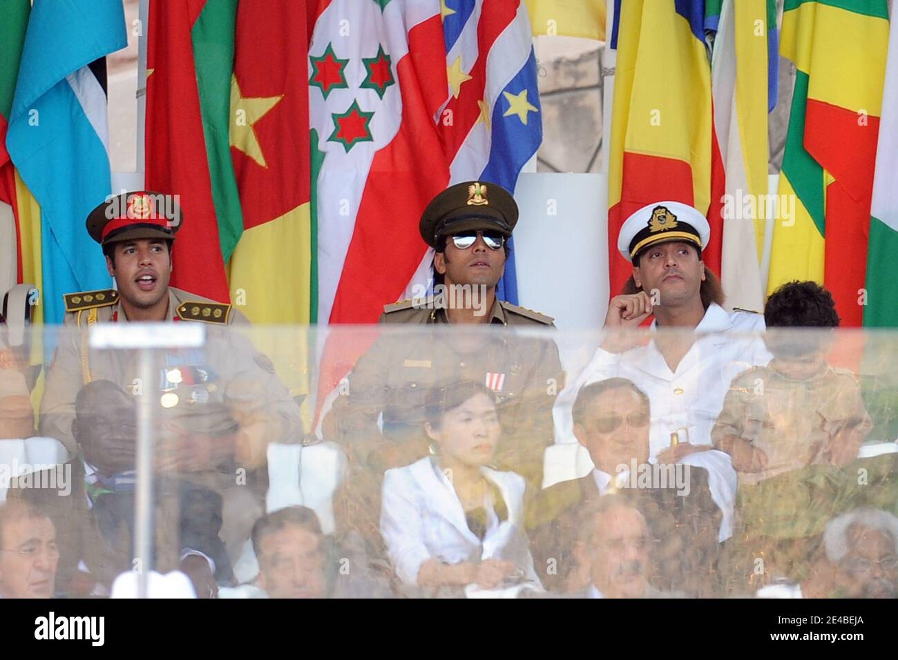 Libyan leader Muammar Gaddafi's sons Khamis (L) and Hannibal (R, white ...