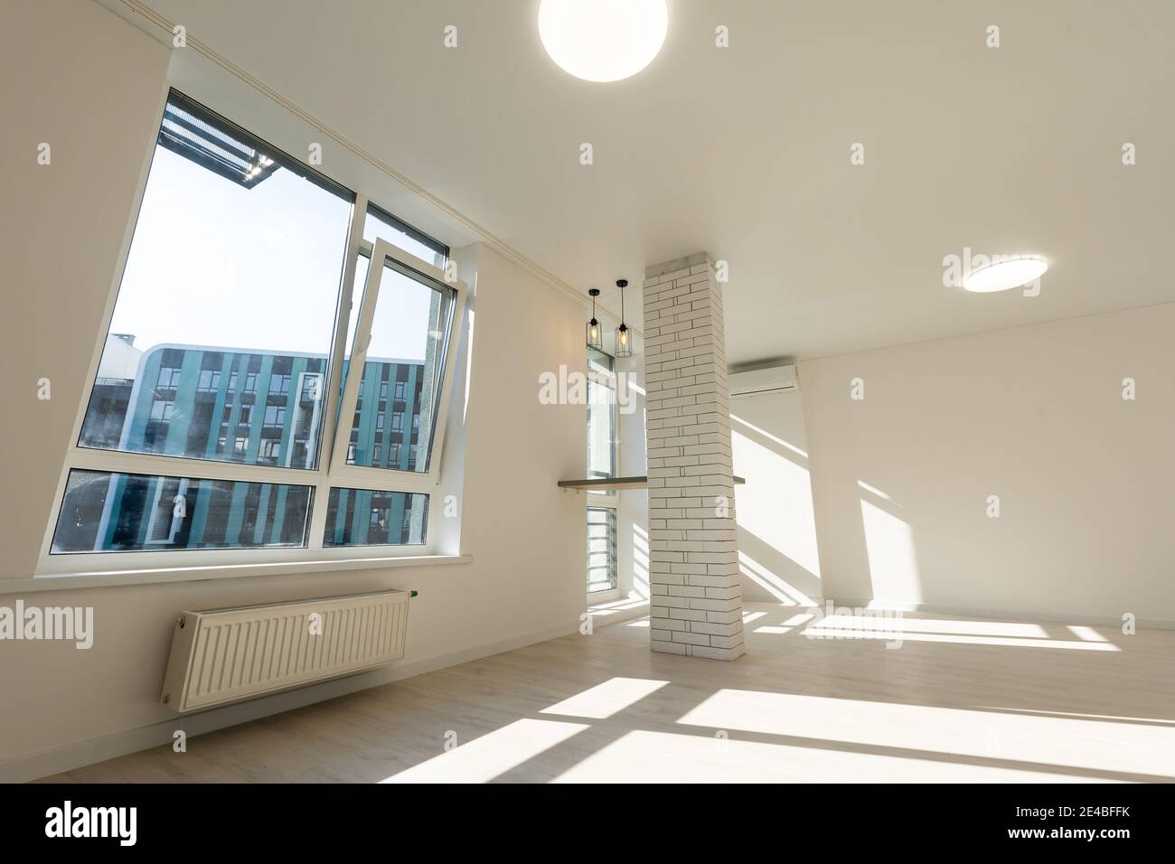 New empty small room in renovated home Stock Photo - Alamy