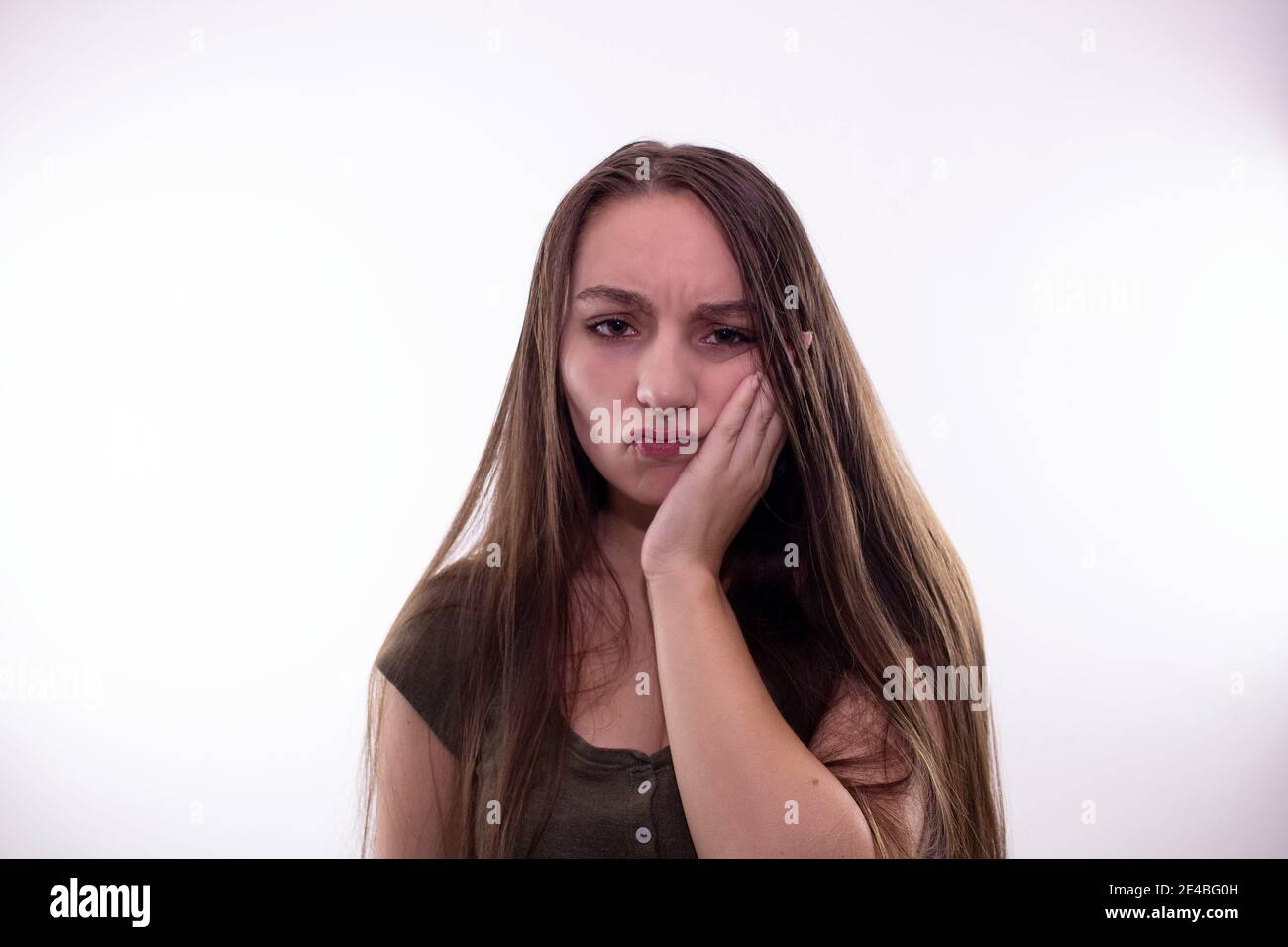 facial expressions on a young woman in the studio Stock Photo - Alamy