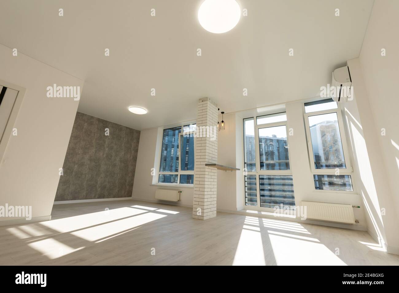 New empty small room in renovated home Stock Photo - Alamy