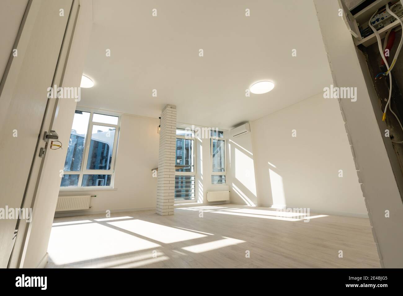 New empty small room in renovated home Stock Photo - Alamy