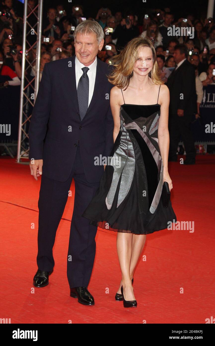 Harrison Ford and partner Calista Flockhart pose at the Centre ...