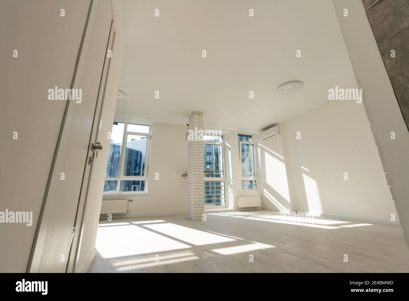 New empty small room in renovated home Stock Photo - Alamy