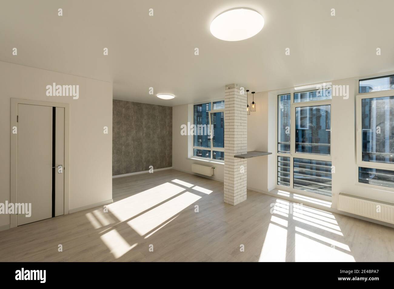 New empty small room in renovated home Stock Photo - Alamy