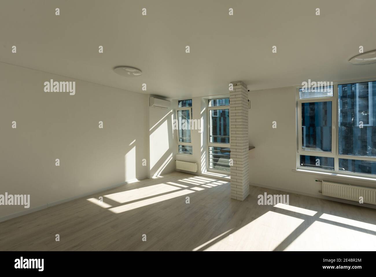 New empty small room in renovated home Stock Photo - Alamy
