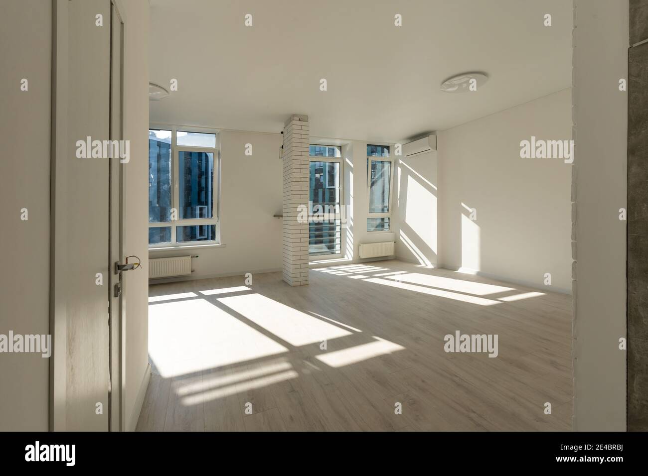 New empty small room in renovated home Stock Photo - Alamy