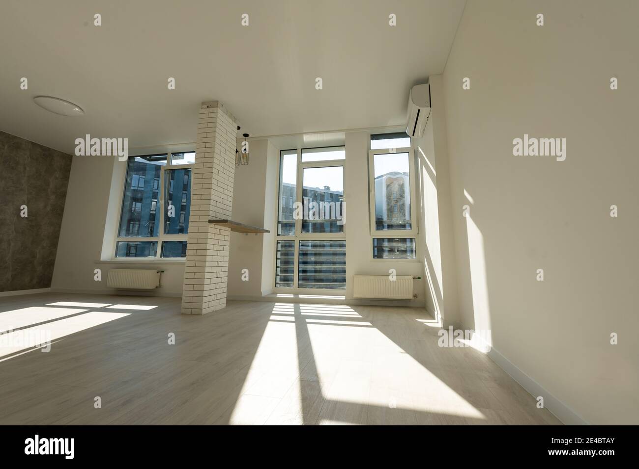 New empty small room in renovated home Stock Photo - Alamy