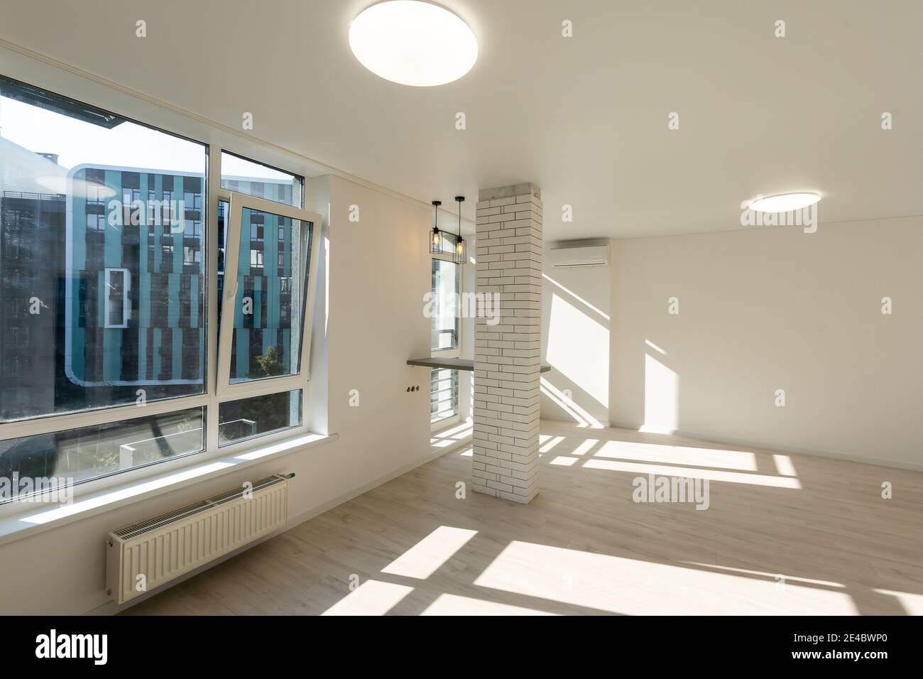 New empty small room in renovated home Stock Photo - Alamy