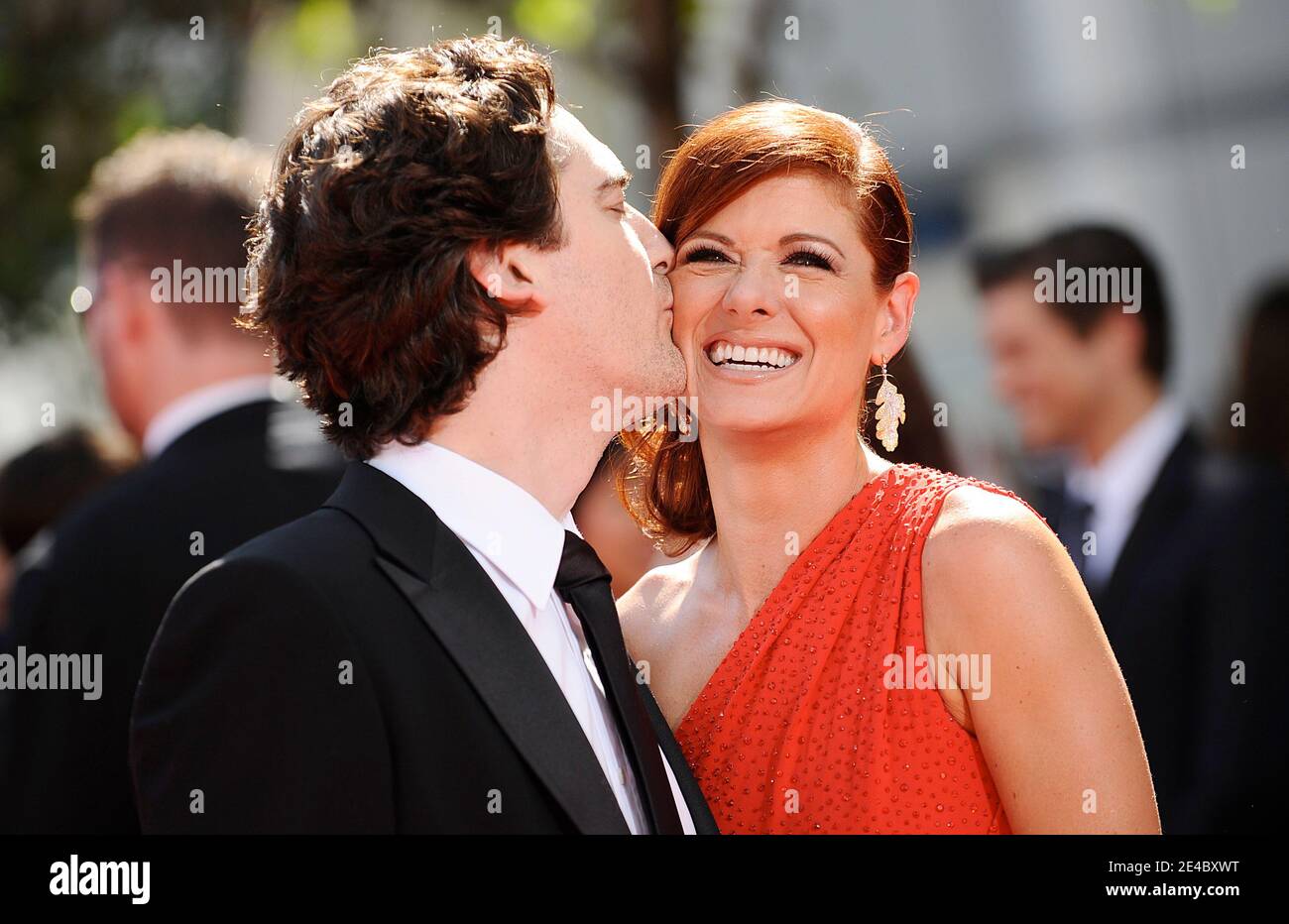Debra Messing and Daniel Zelman arriving at the 61st Annual Primetime ...
