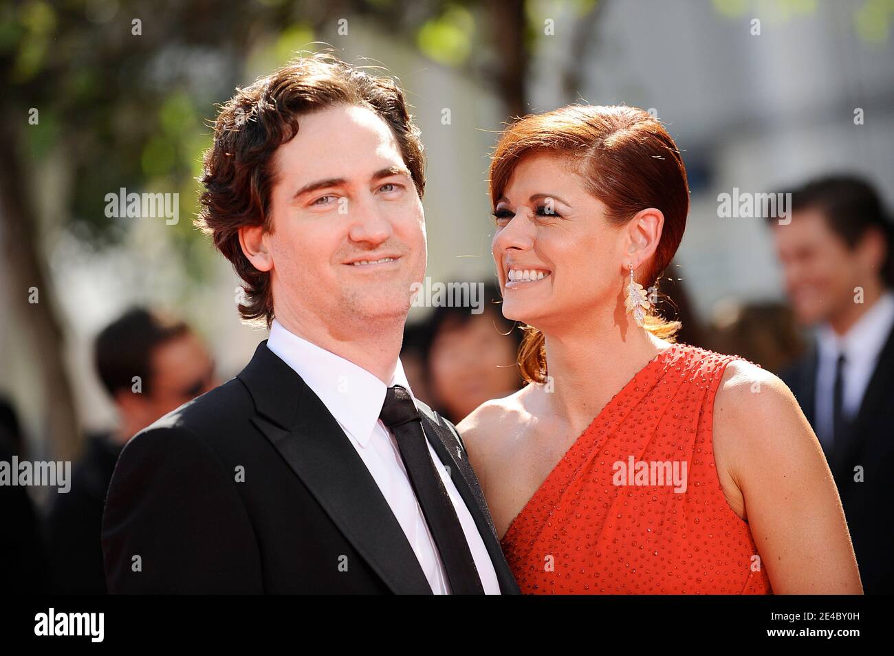Debra Messing and Daniel Zelman arriving at the 61st Annual Primetime ...