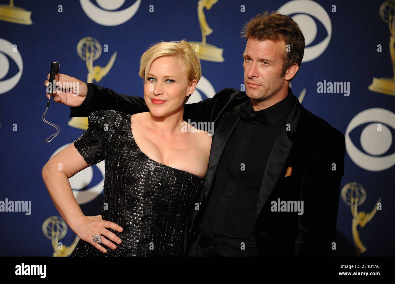 Patricia Arquette and Thomas Jane posing in the press roomm of the 61st ...