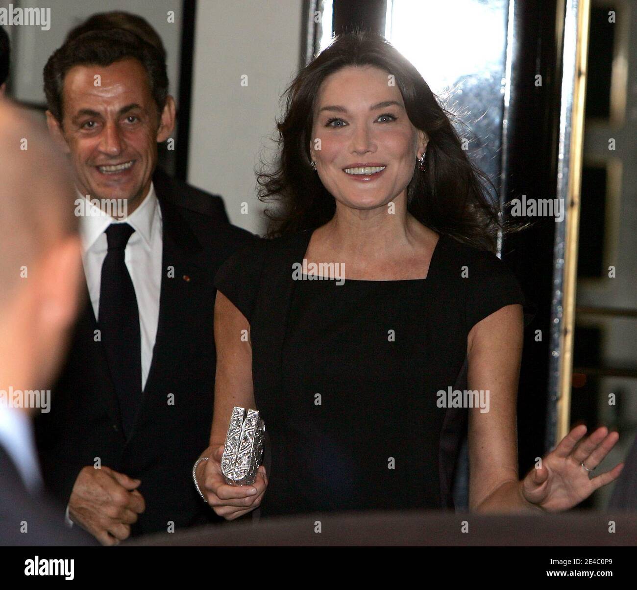 French president Nicolas Sarkozy and his wife Carla Bruni-Sarkozy are ...