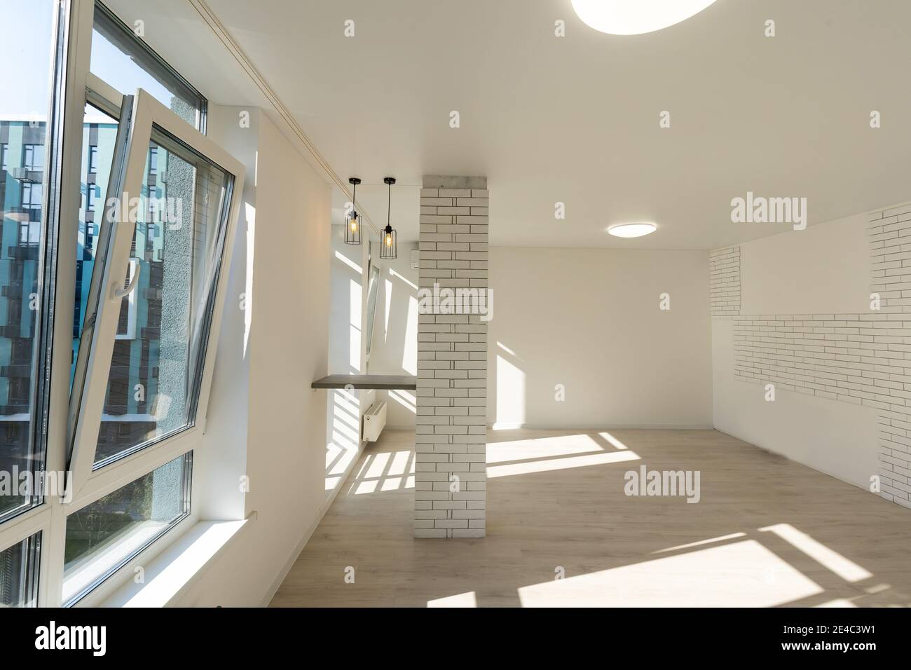 New empty small room in renovated home Stock Photo - Alamy