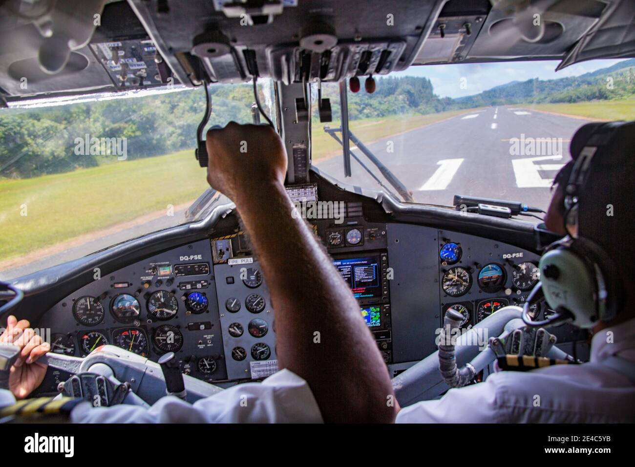 A view between the pilot and copilot out of the cockpit of a Pacific ...