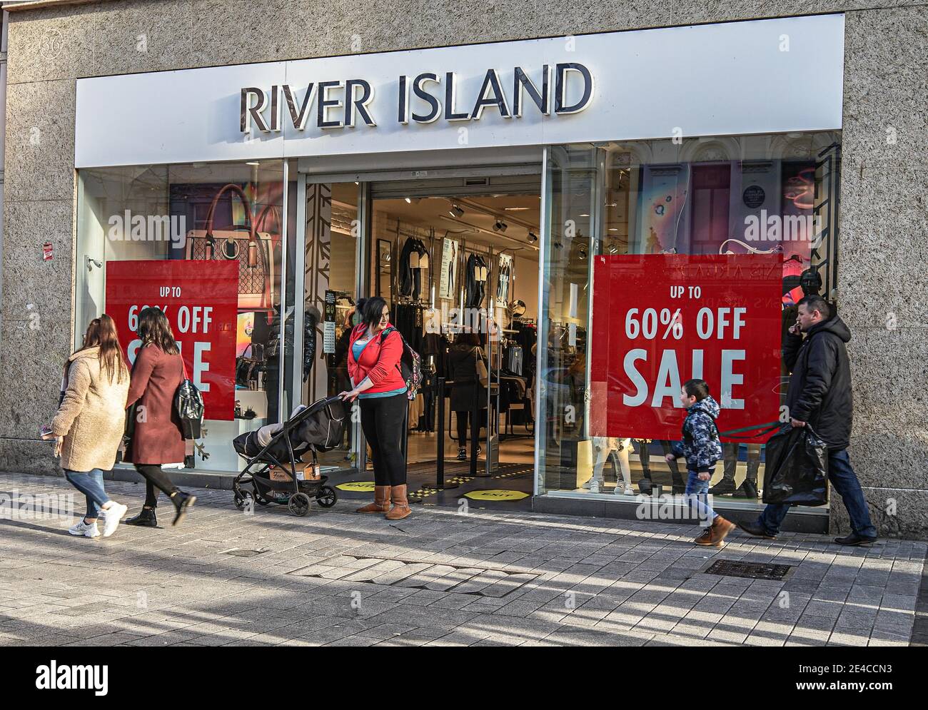 Shoppers walk past River Island Store Stock Photo - Alamy