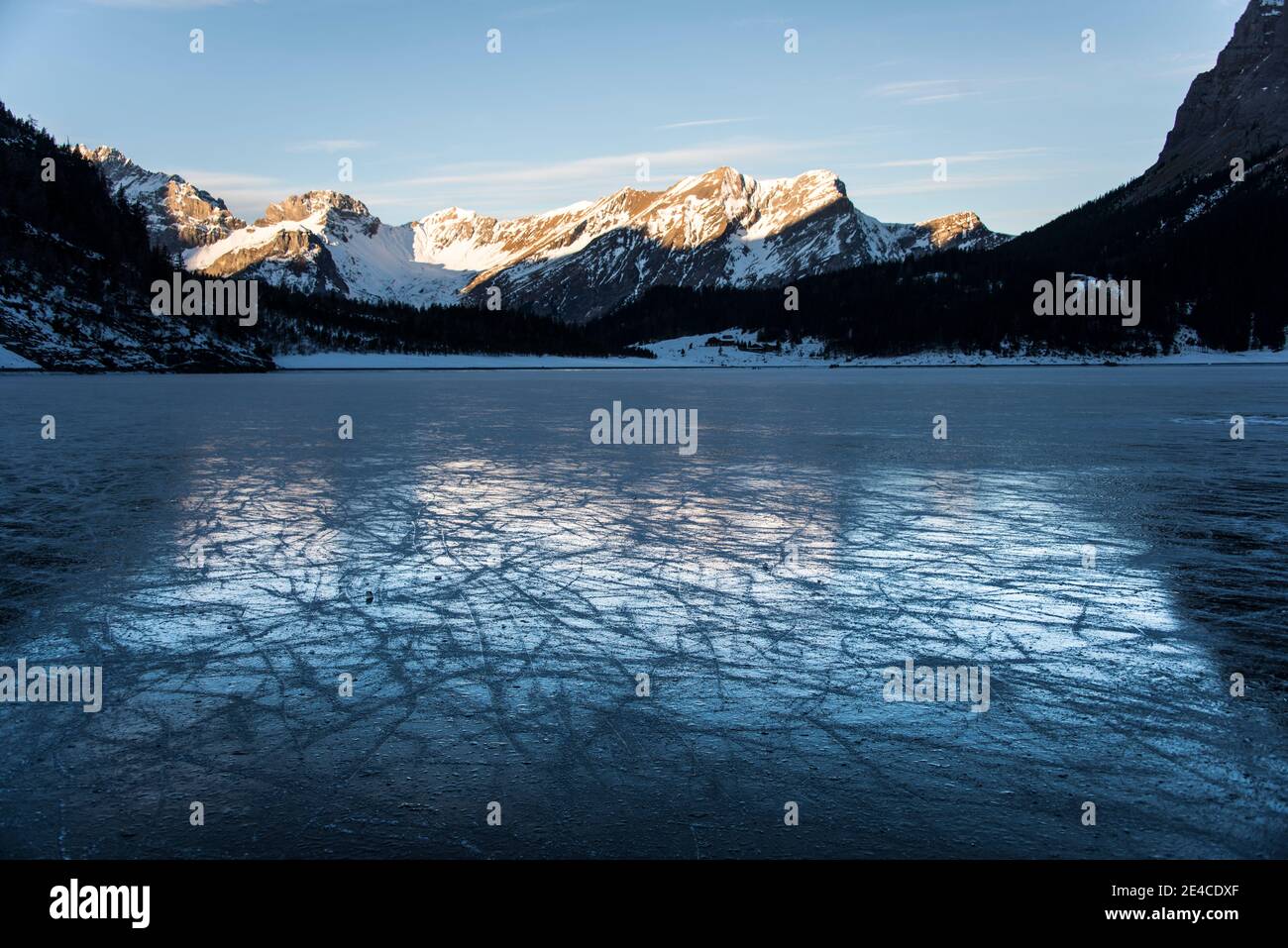 frozen mountain lake at daybreak Stock Photo - Alamy