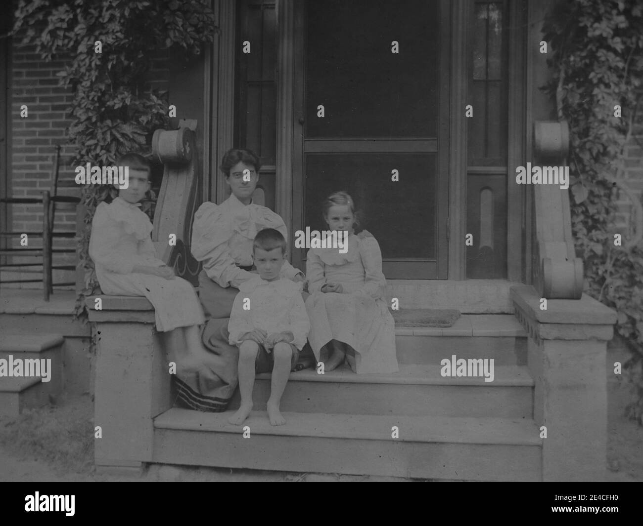 American archive monochrome family portrait of a mother and three ...