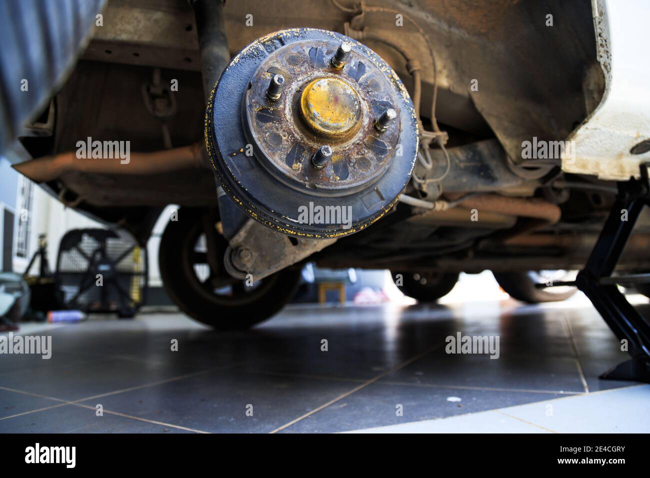 A rear hub of the car after removing a tire and wheel, maintaining a ...