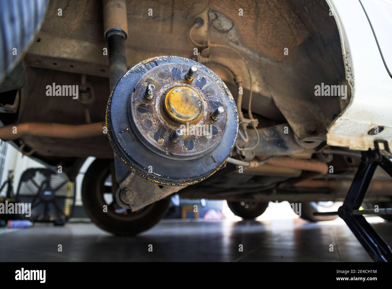 A rear hub of the car after removing a tire and wheel, maintaining a ...