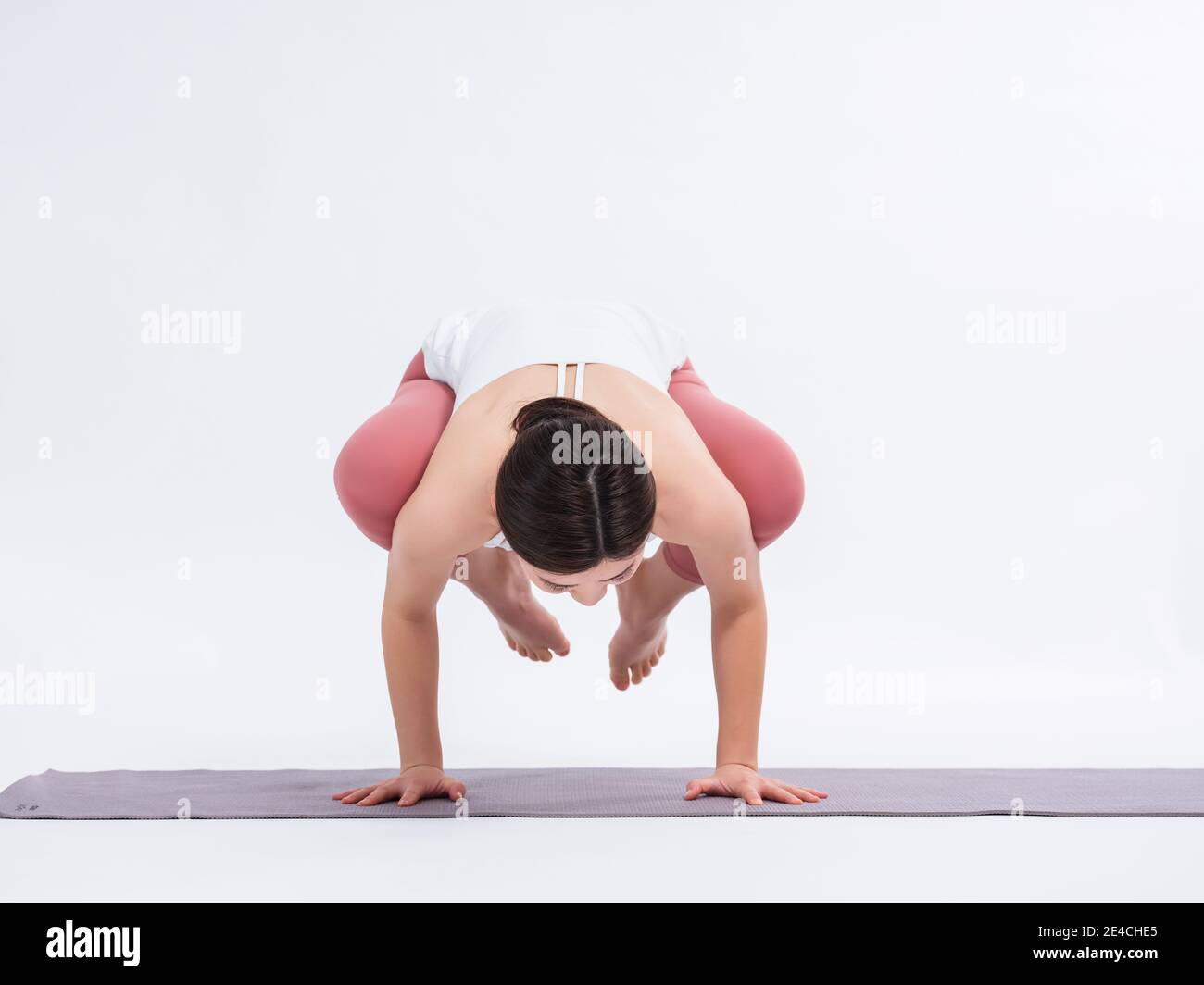 Young women practice yoga place hands on floor Stock Photo - Alamy