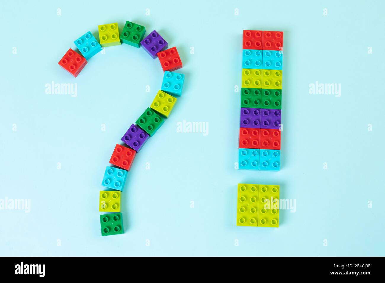 Question and punctuation marks made of colorful building toy blocks ...