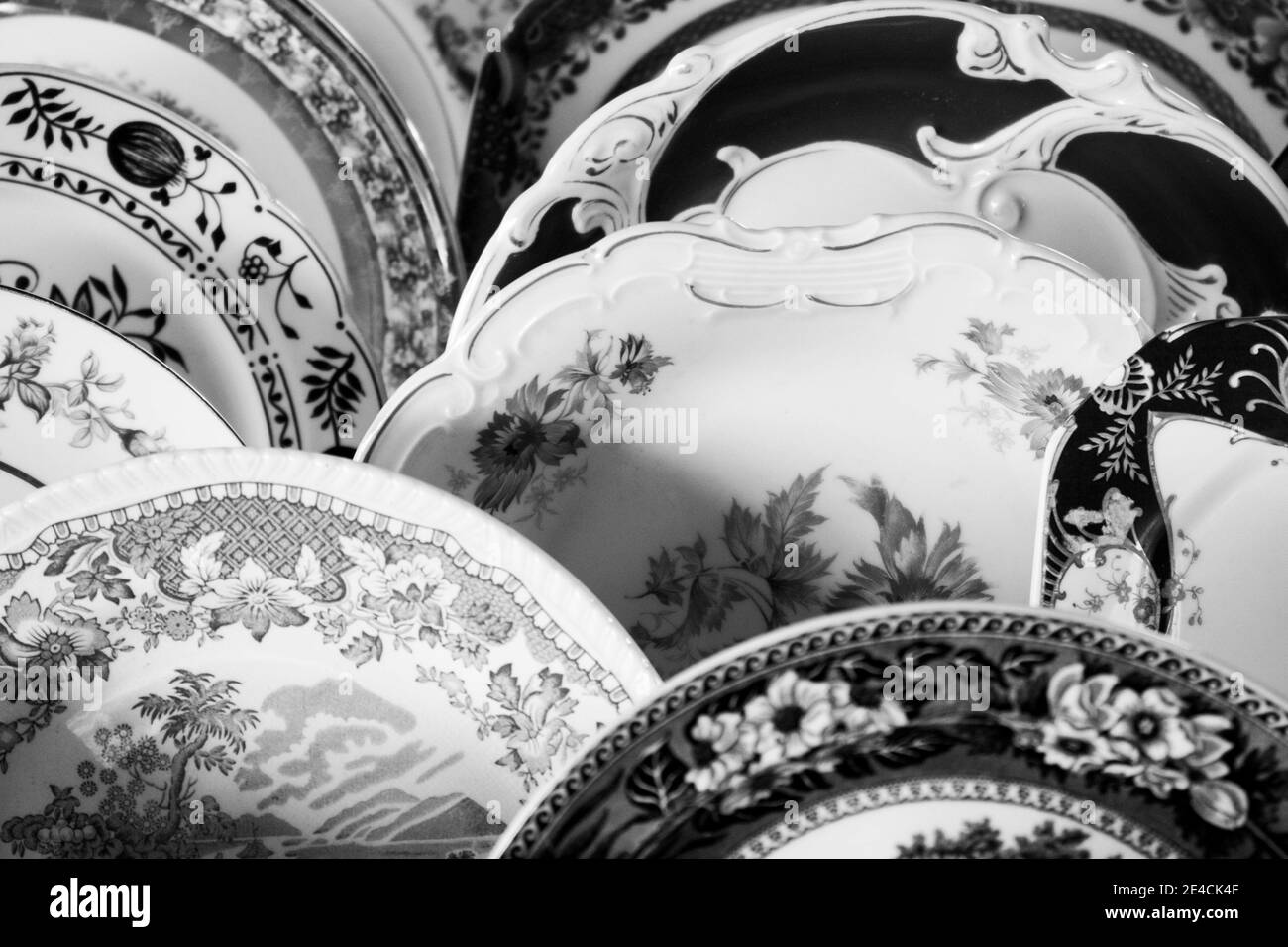 Pieces displayed in a group of multiple textured plates Stock Photo - Alamy