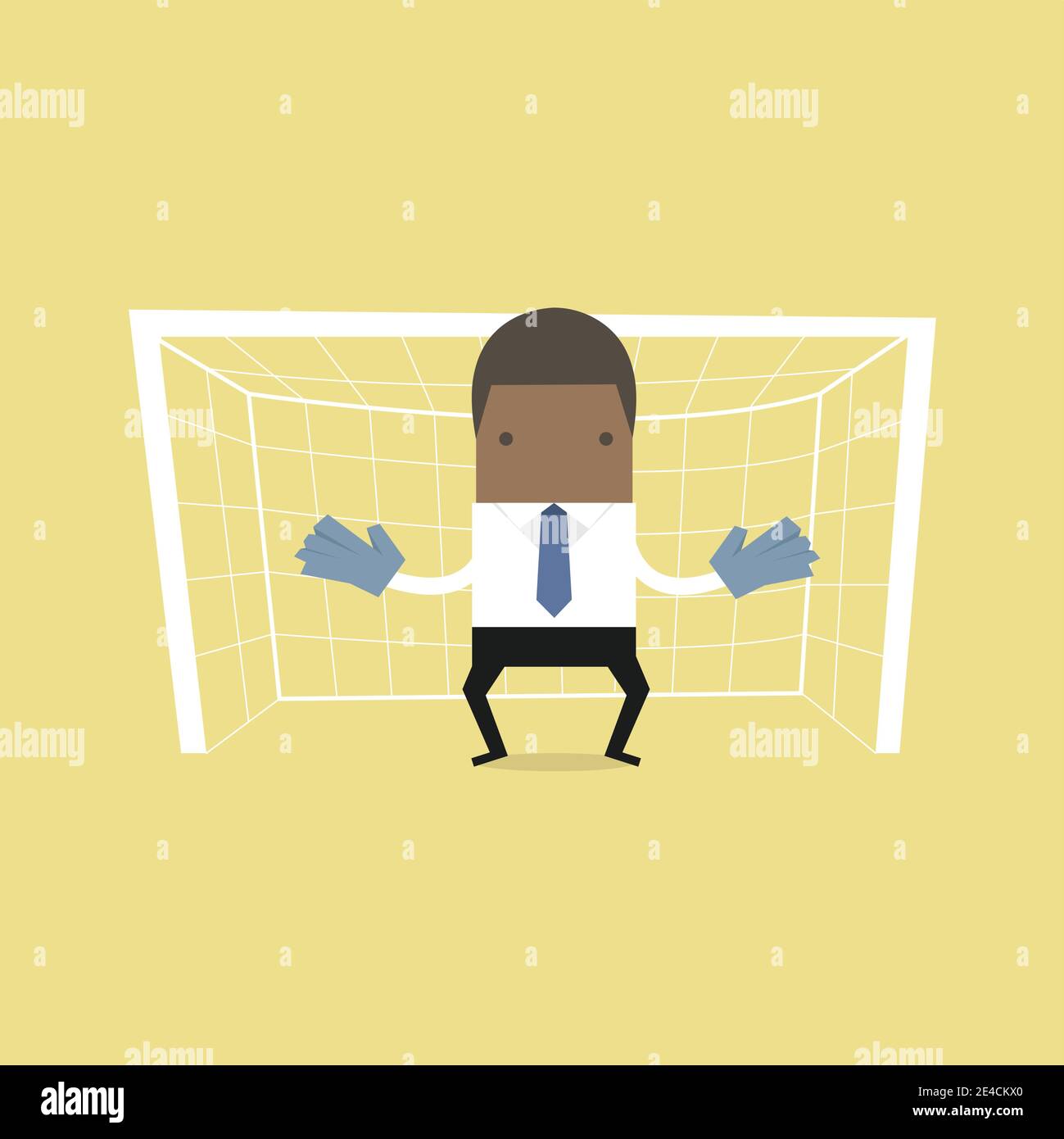 African businessman playing goalkeeper standing in front of goal Stock ...