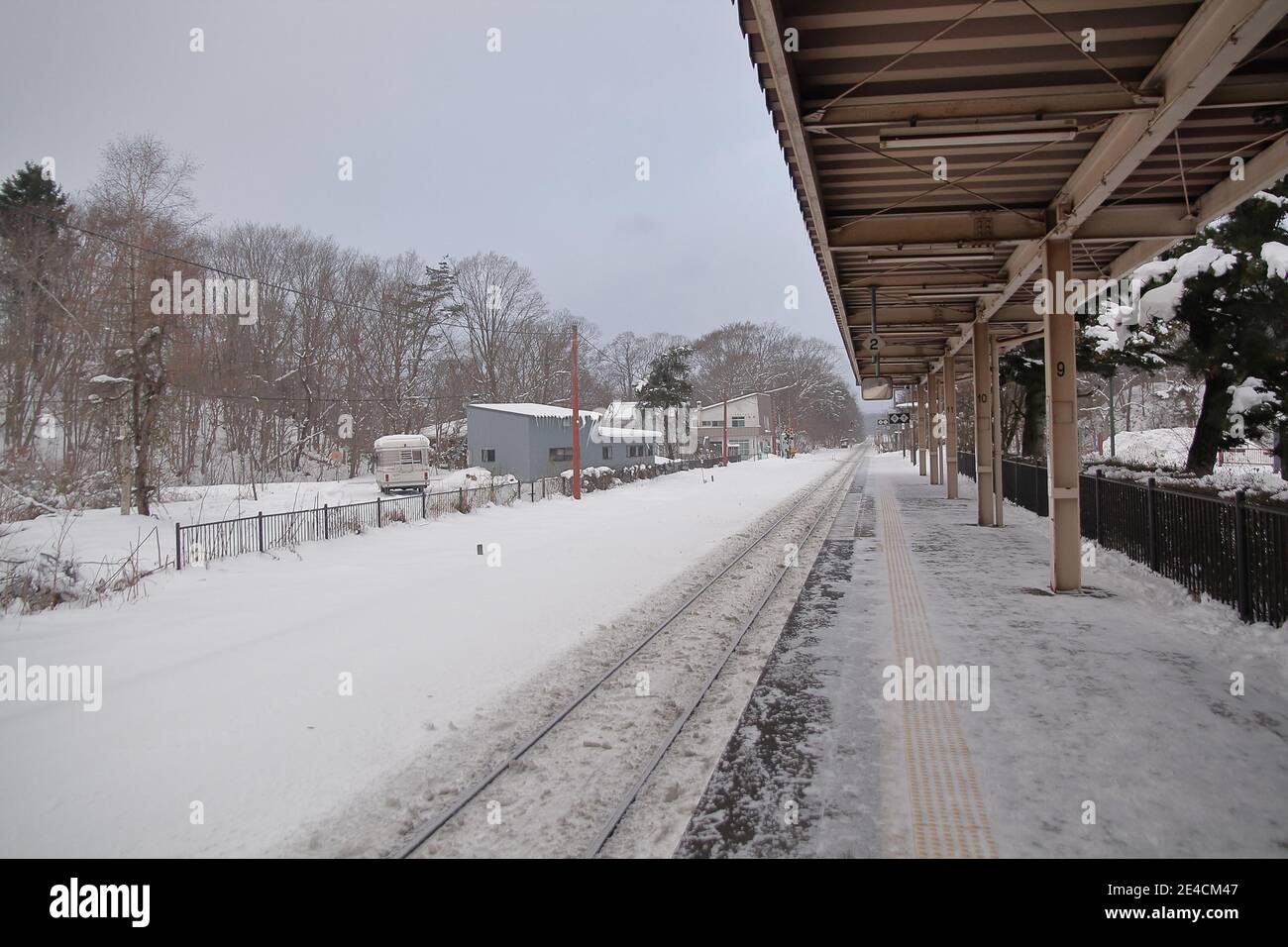 the winter train station with snow landscape in Hokkaido, Japan Stock ...