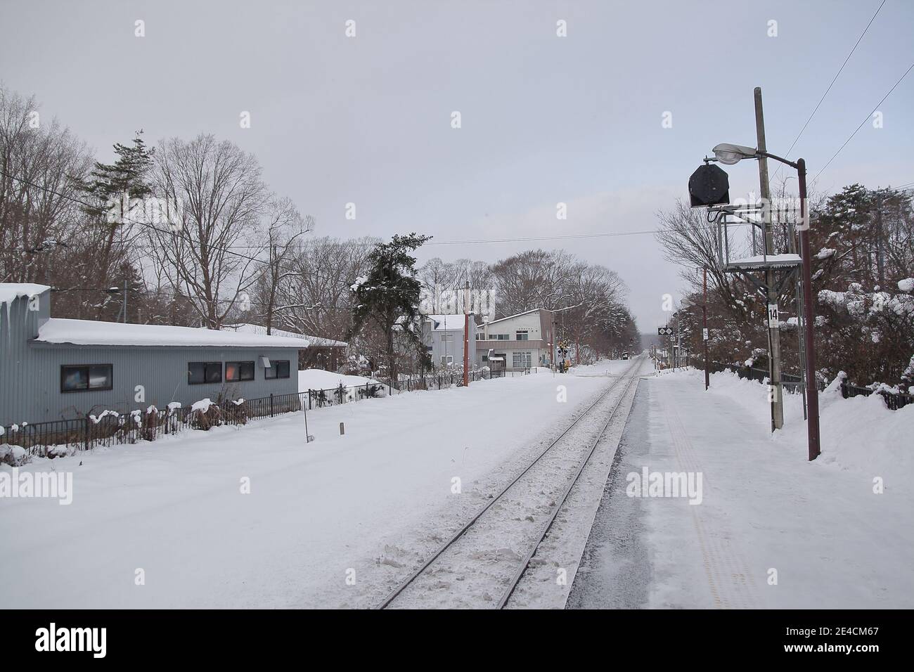 the winter train station with snow landscape in Hokkaido, Japan Stock ...