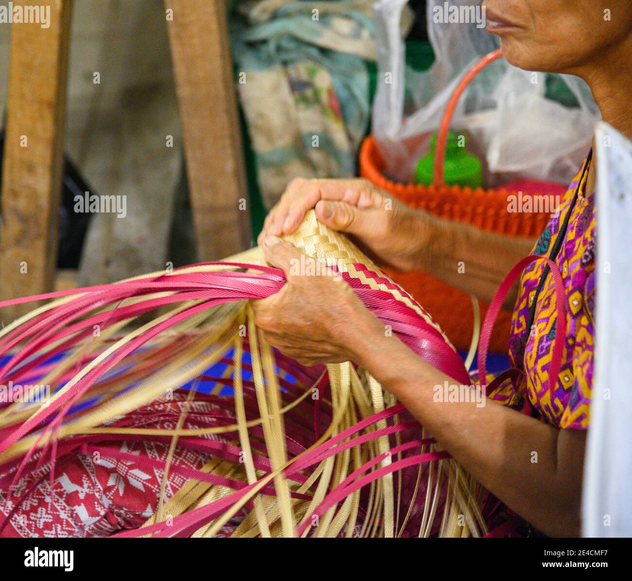 Woman weaving basket hi-res stock photography and images - Alamy